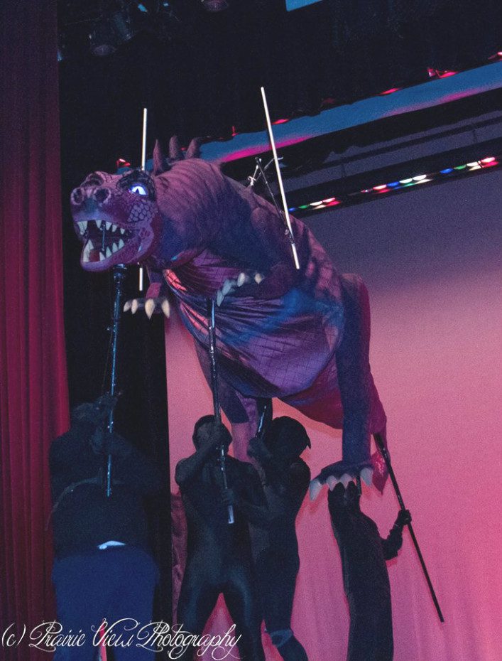 Dragon with Puppeteers – DLO Musical Theatre